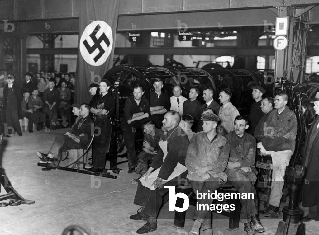 Image of Radio broadcast in a cable factory, 1936 (b/w photo)