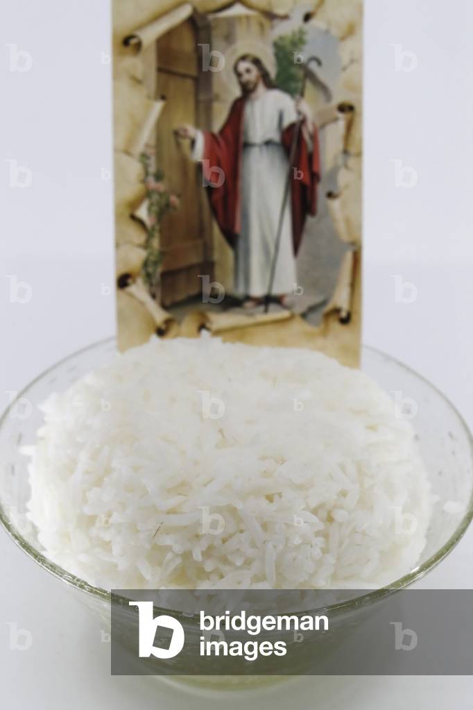 Image of Image of Jesus and bowl of rice during Lent. A
