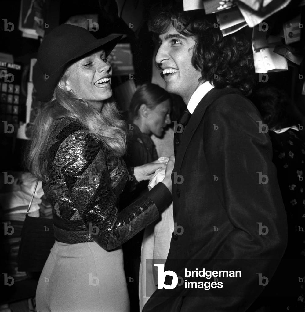 Image of Actress Odile Rodin and her husband Paulo Marinho in fashion