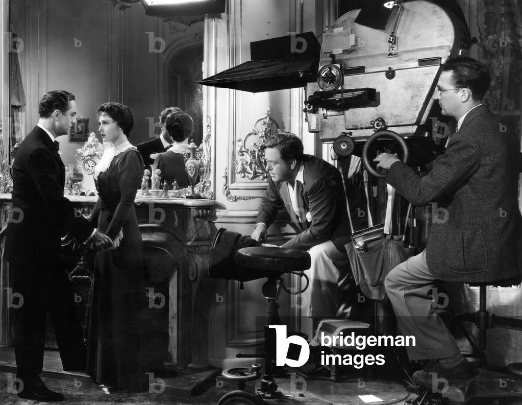 Image of William Powell, Luise Rainer, Director Robert Z. Leonard, on-set