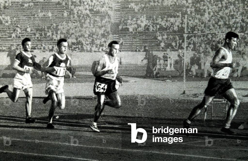 Image of Janusz Kusocinski running in the 10000 Meter race during the