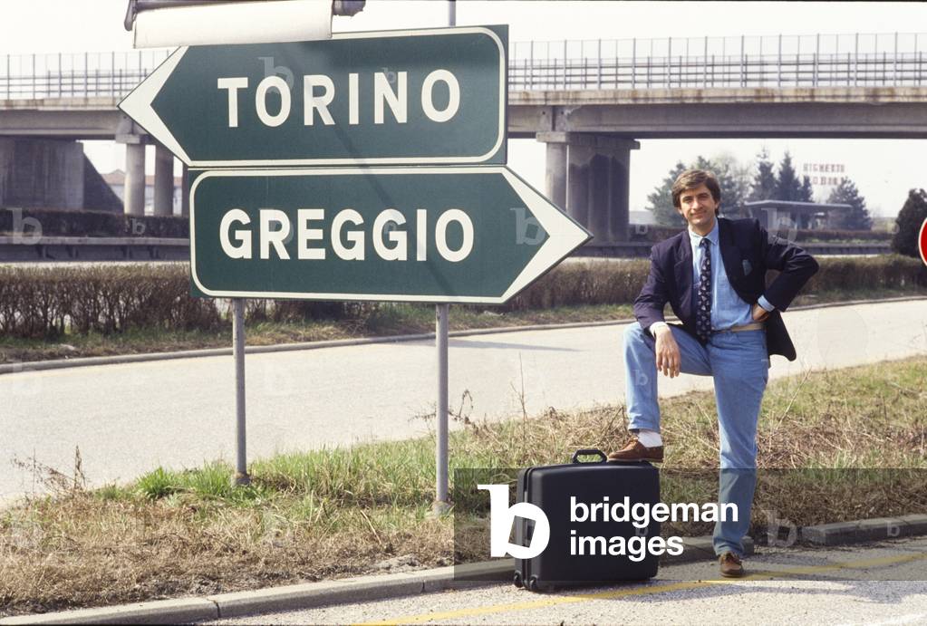 Image of Ezio Greggio at the morotway junction for the city of