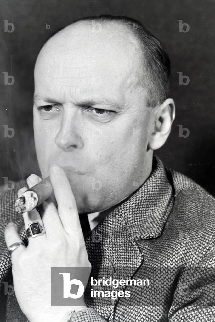 Image of A man smoking a cigar for an advertising campaign, Germany