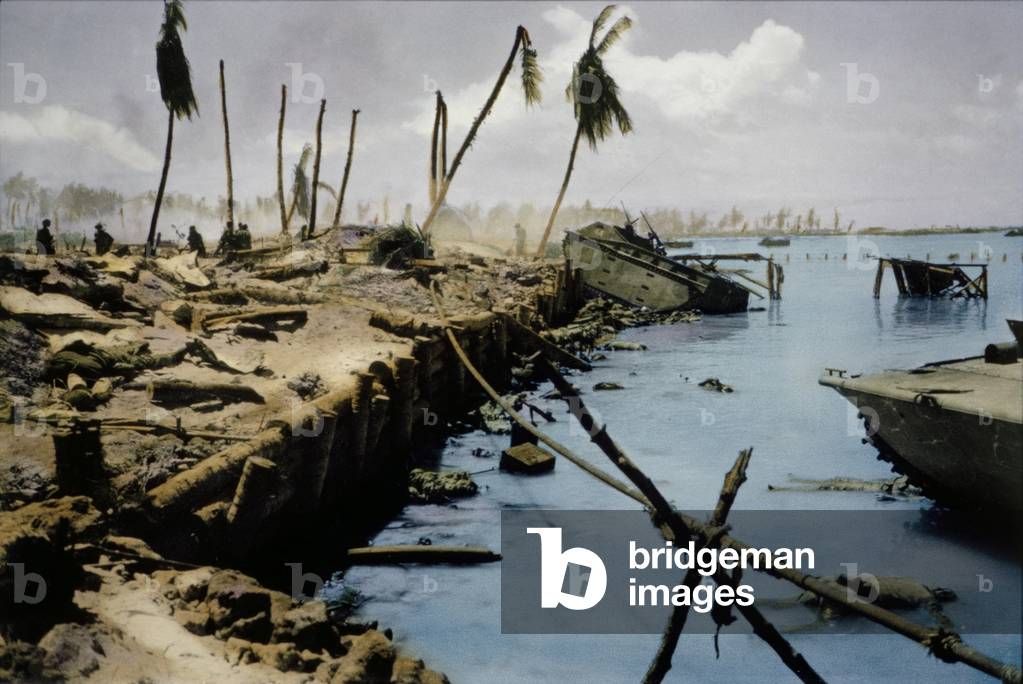 Image of Dead Bodies in Water and on Beach with onlooking U.S.
