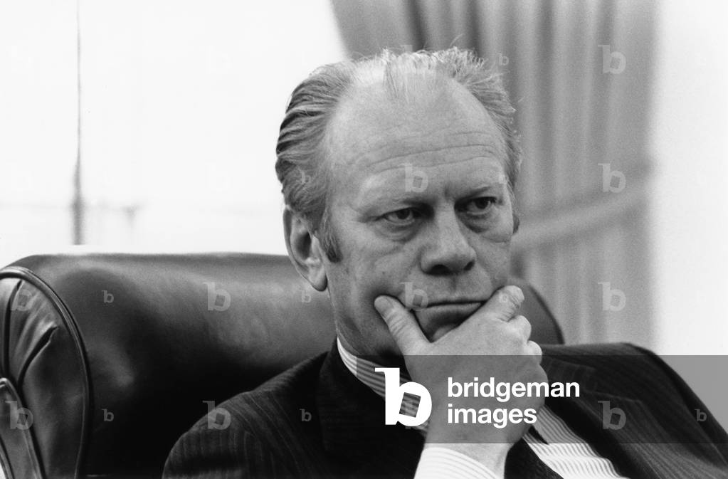 Image of President Gerald Ford listening to Henry Kissinger during the ...