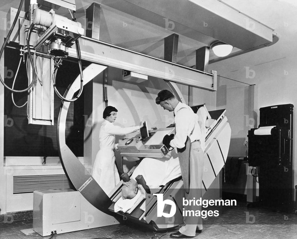 Image of Male radiologist with a female radiologist taking an x-ray of