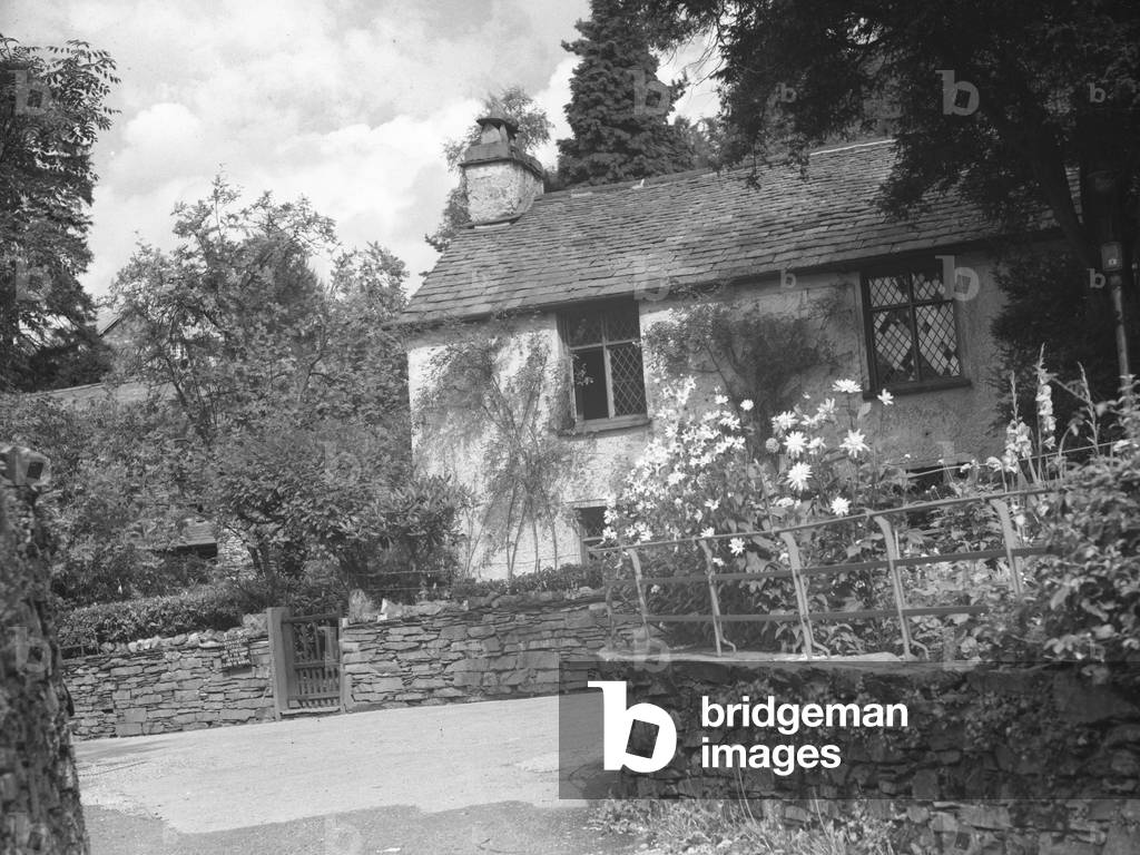 Image of A view of the front façade of Wordsworth's Dove Cottage by ...