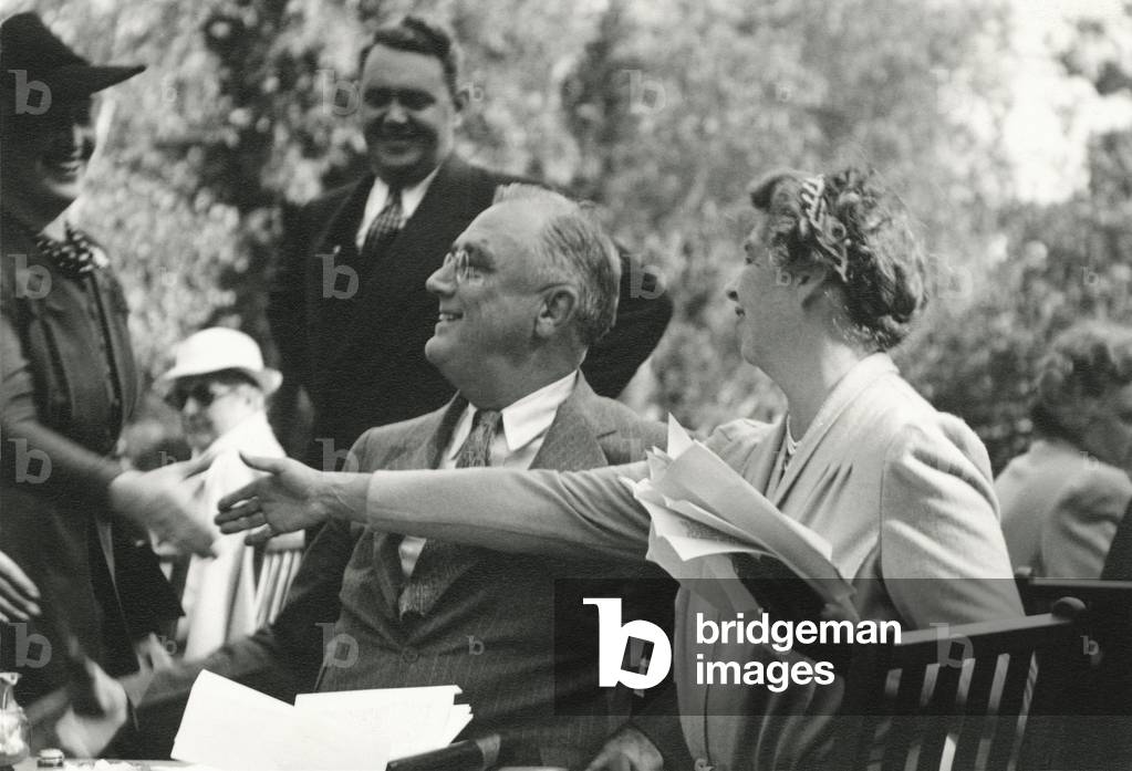 Image of Franklin and Eleanor Roosevelt at a high school dedication. Hyde