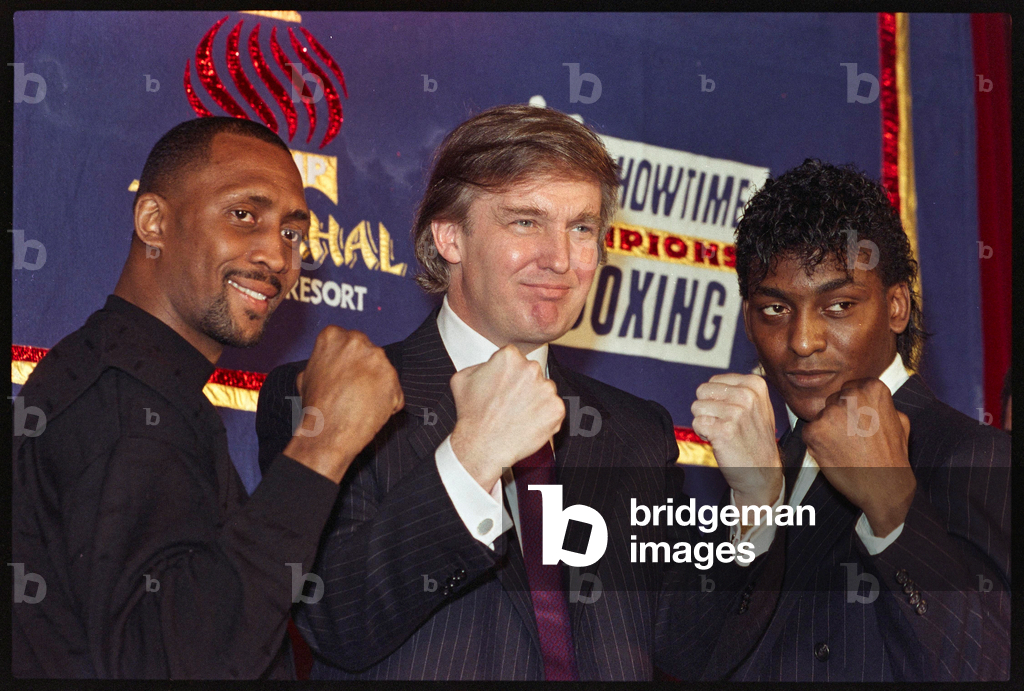 Image of Donald Trump raises his fists next to Thomas Hearns and by ...