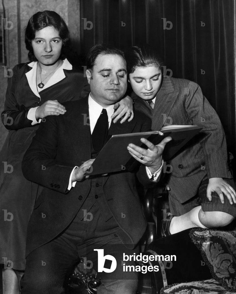 Image of Opera singer Beniamino Gigli at home with his daughter Esther