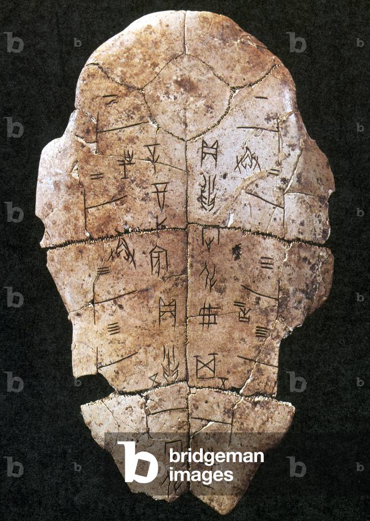 CHINA: ORACLE SHELL A tortoise shell inscribed with Chinese characters ...