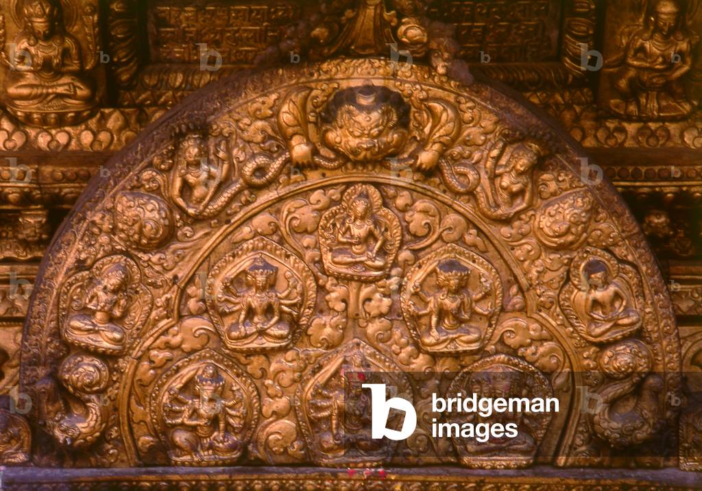 Image of Nepal: Die vergoldete Spitze einer Torana (Tor) am Changu Narayan
