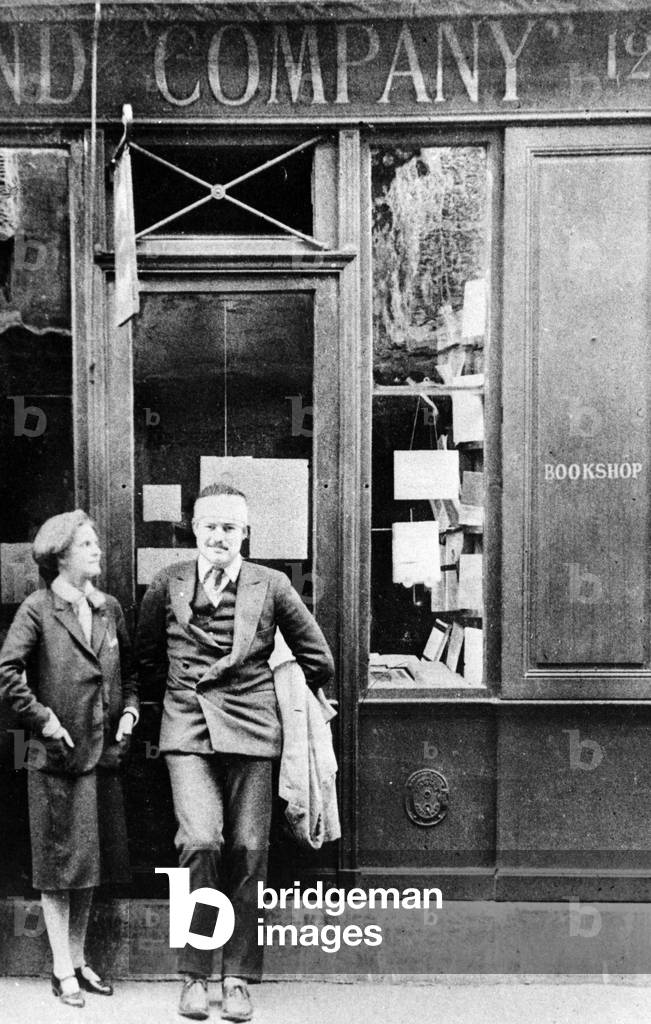 Image of Sylvia Beach and Ernest Hemingway in front of Shakespeare and ...