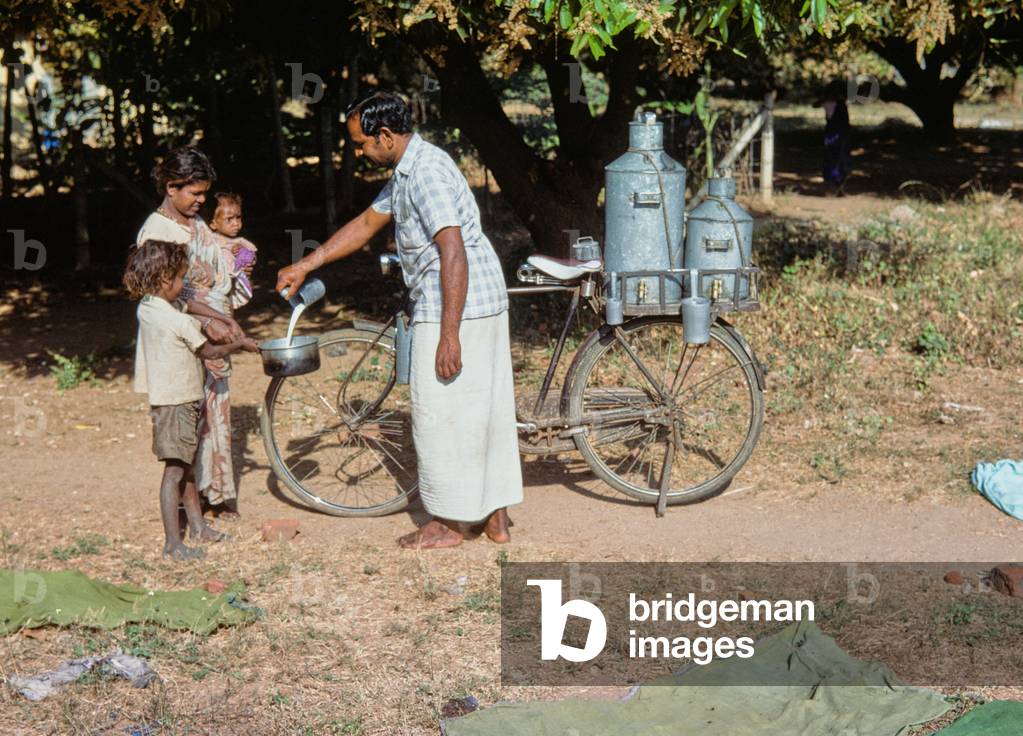 Image of Milkman on bicycle, village scene, Vellore, Tamil Nadu, South ...