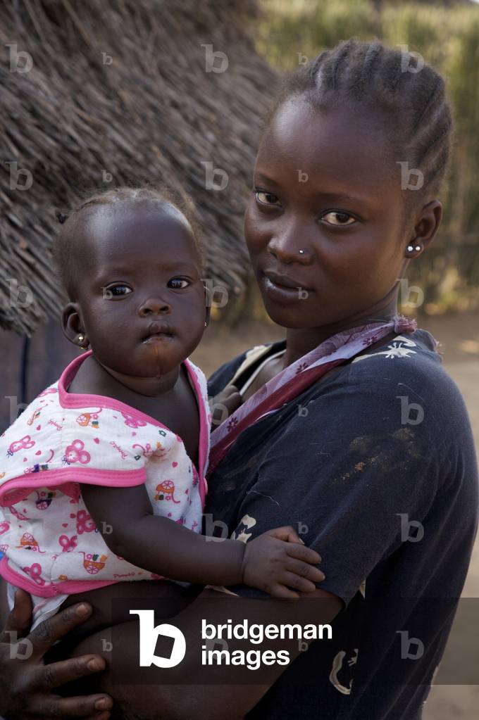 Image of A mother and her child, in Munuki neighbourhood, in Juba,