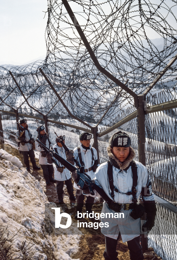Image of Soldiers of ROK Army patrolling along border of the DMZ by ...