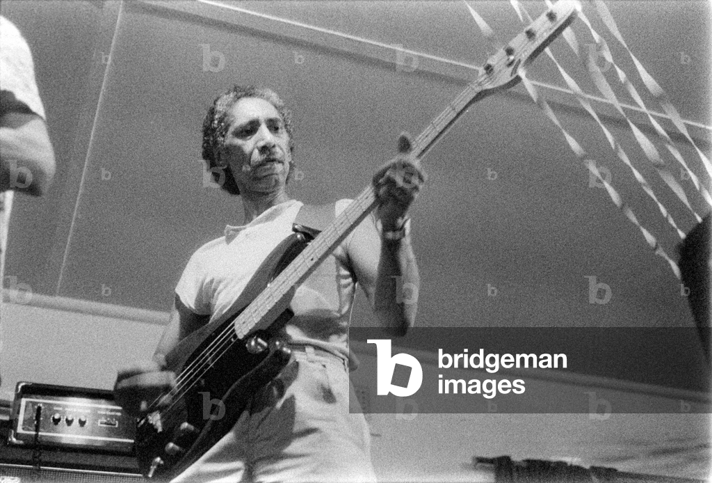 Image of Black and white photo of Paul Abrahams playing the electric