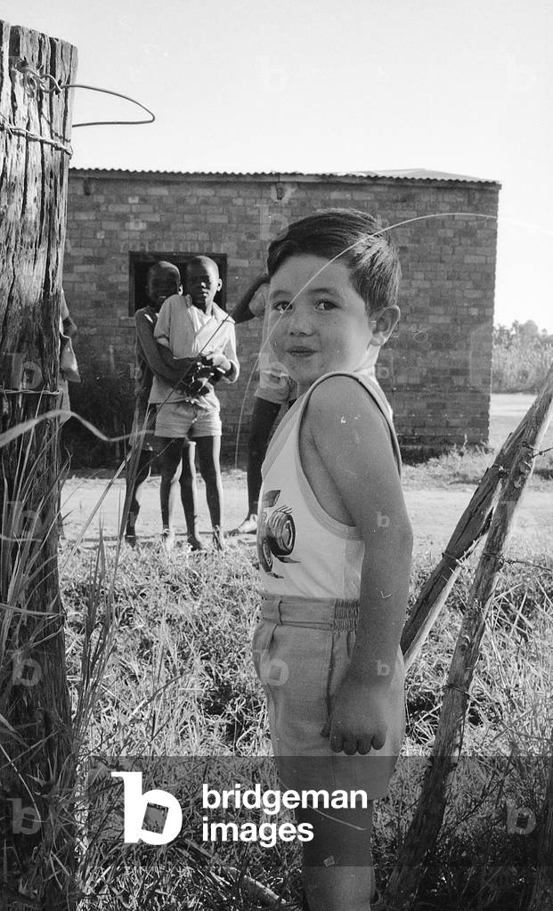 Image of Children playing on cattle farm in Rhodesia, 1976 (b/w film by ...