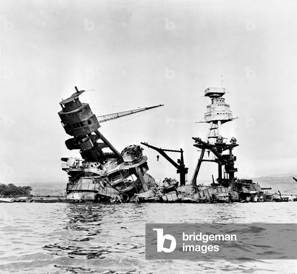 Image of After the fire. Battered by aerial torpedoes and bomb hits,