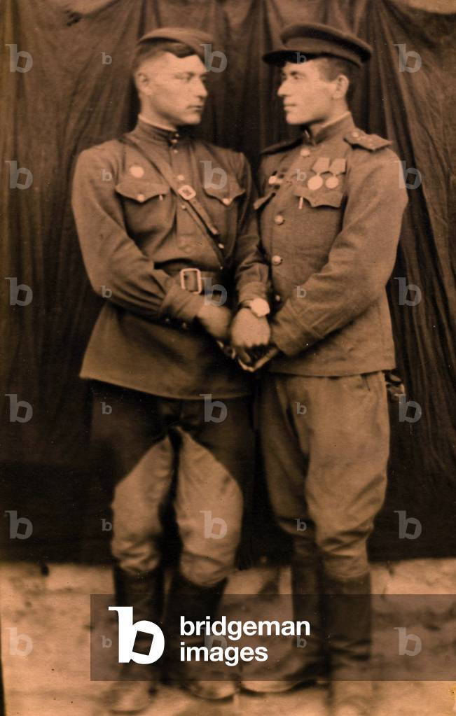 Image of Portrait of two Soviet soldiers holding hands and looking into