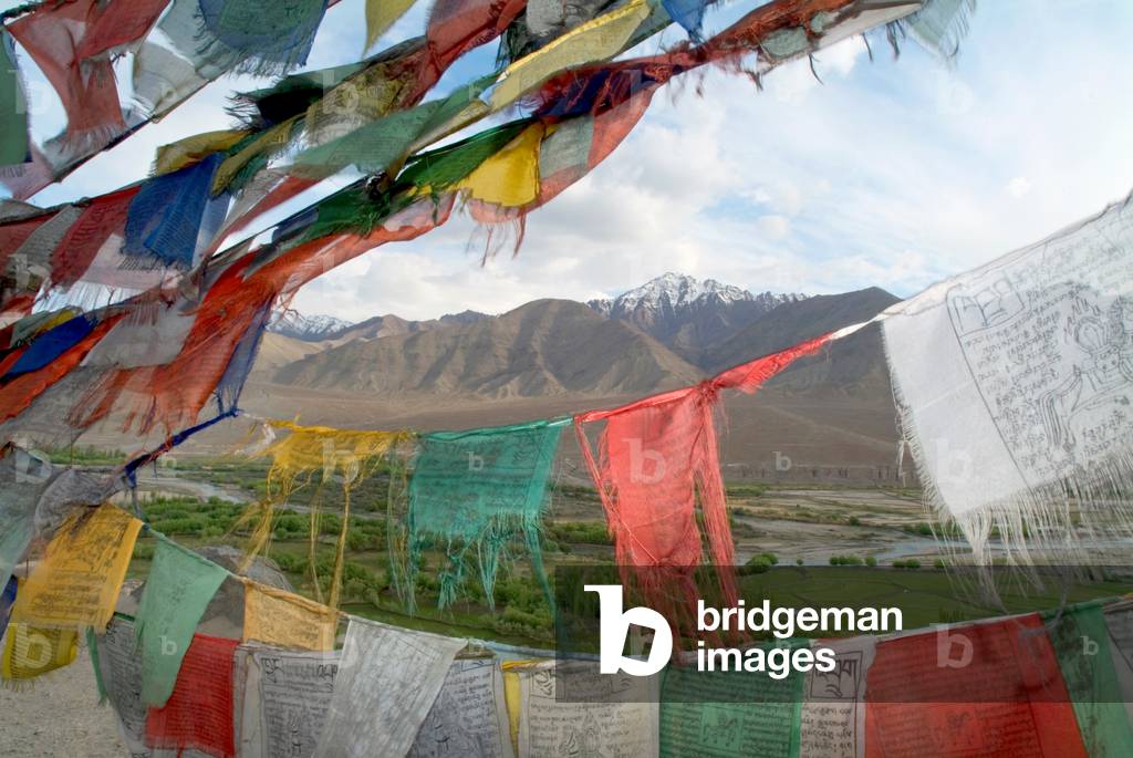 Image of Tibetan Buddhist prayer flags above the Indus Valley (photo)