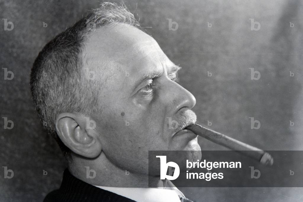 Image of A man smoking a cigar for an advertising campaign, Germany