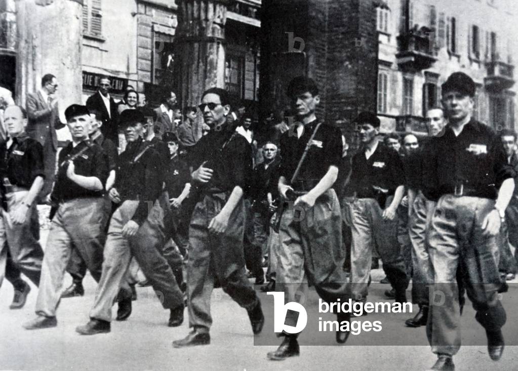 Image of The Black Brigade 'Aldo Resega' parading through the streets of