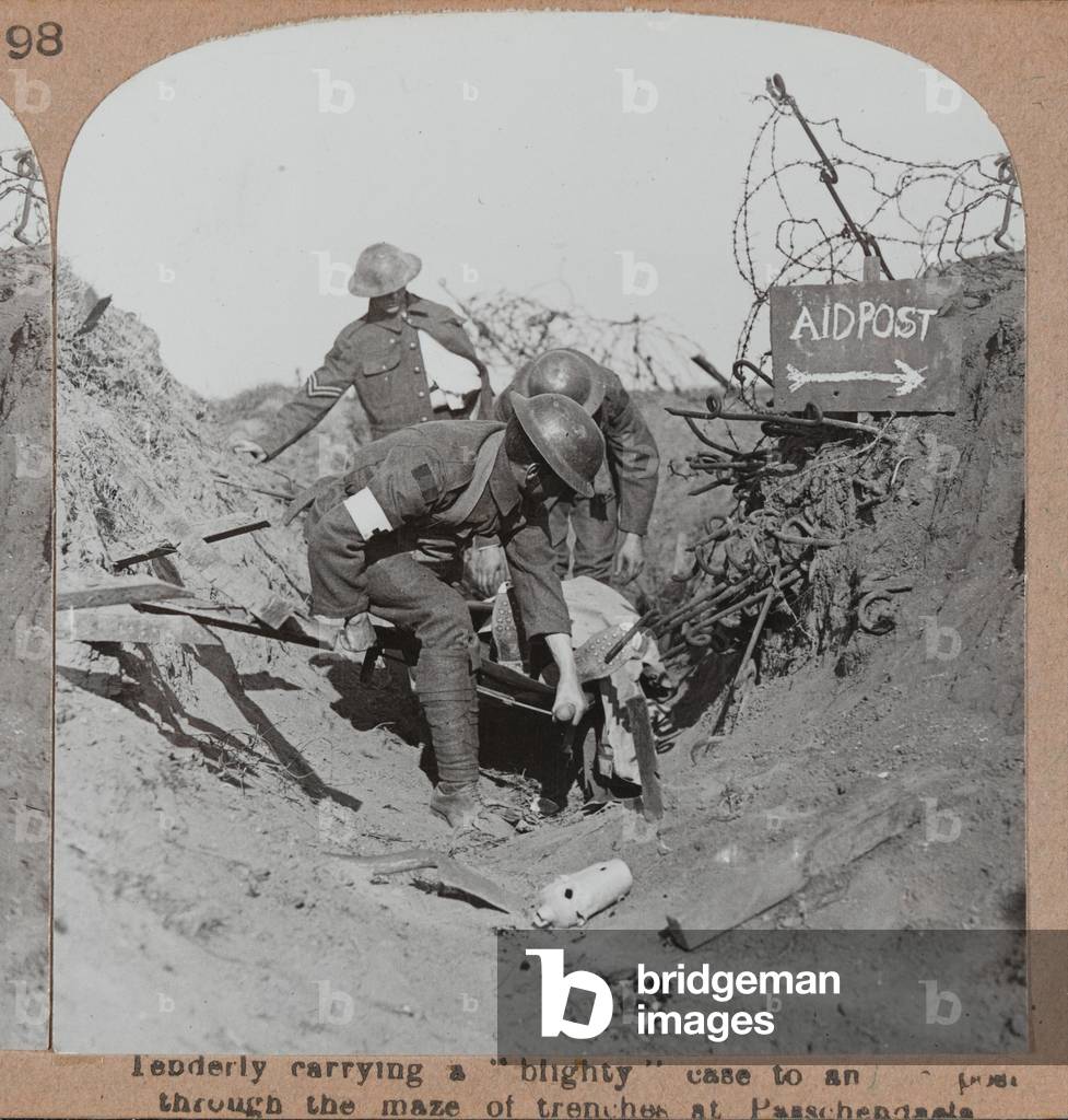 Image of Tenderly carrying a blighty case to an aidpost through the by ...