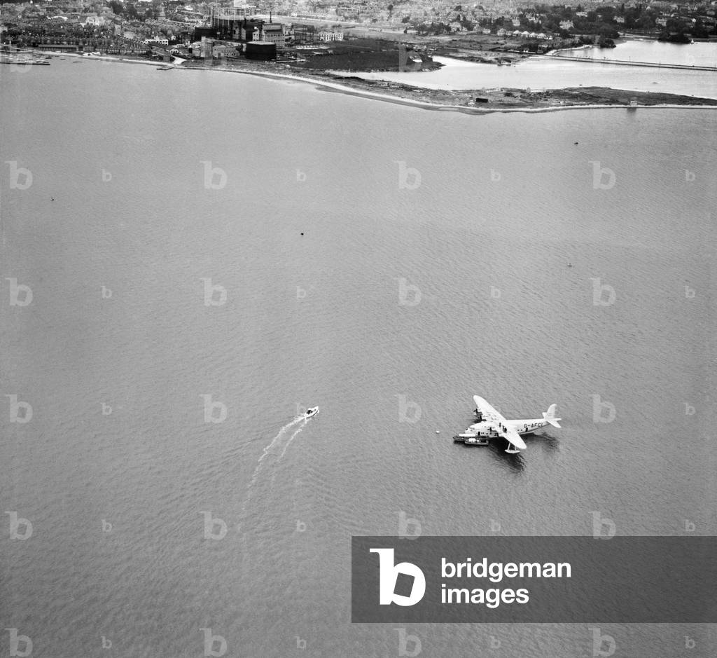 Image of Short S.26 seaplane Golden Hind (G-AFCI) at anchor in Poole
