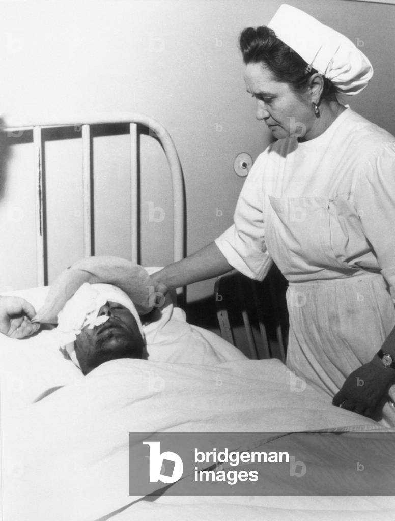 Image of A wounded helped by a nurse, Lanzo Torinese, Italy