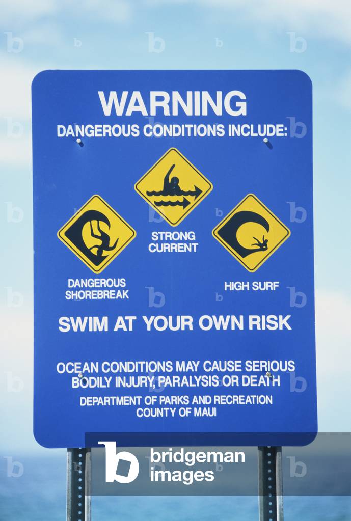 Image of Blue sign warning of swimming hazards